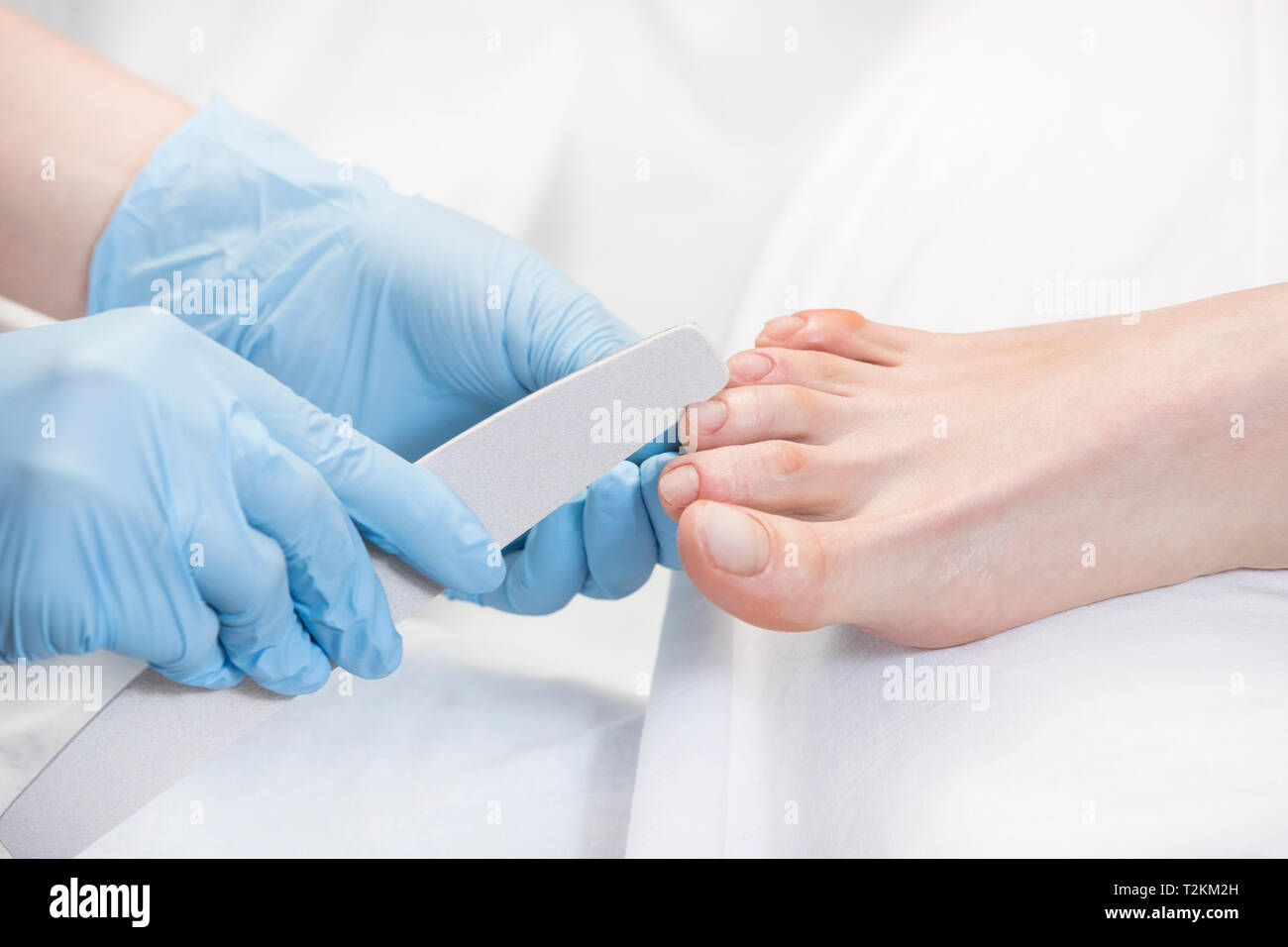 Process of pedicure of female legs at beauty salon Stock Photo - Alamy