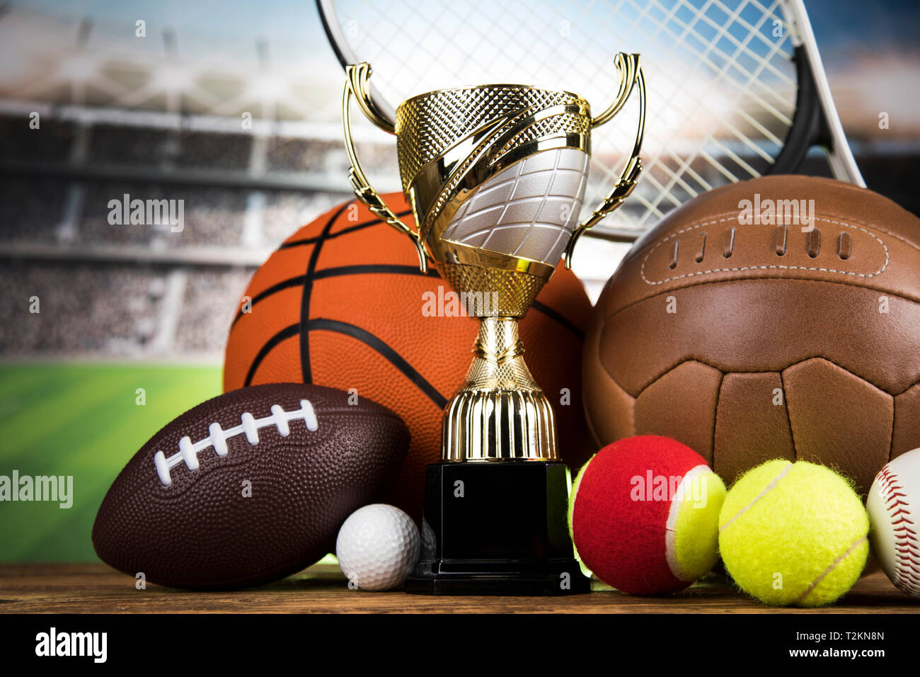 Winner trophy, Sport equipment and balls Stock Photo - Alamy