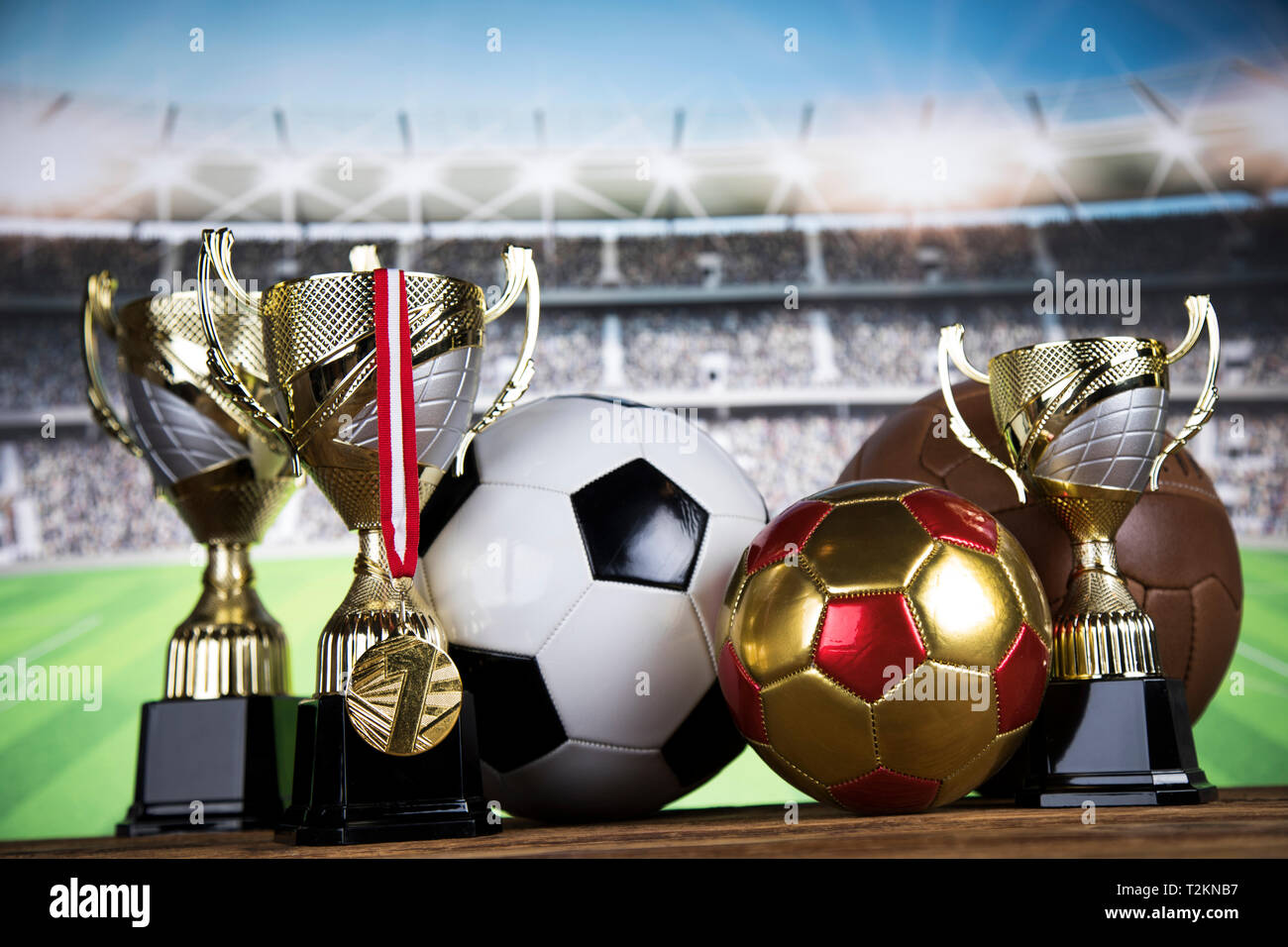 Winner trophy, Sport equipment and balls Stock Photo - Alamy