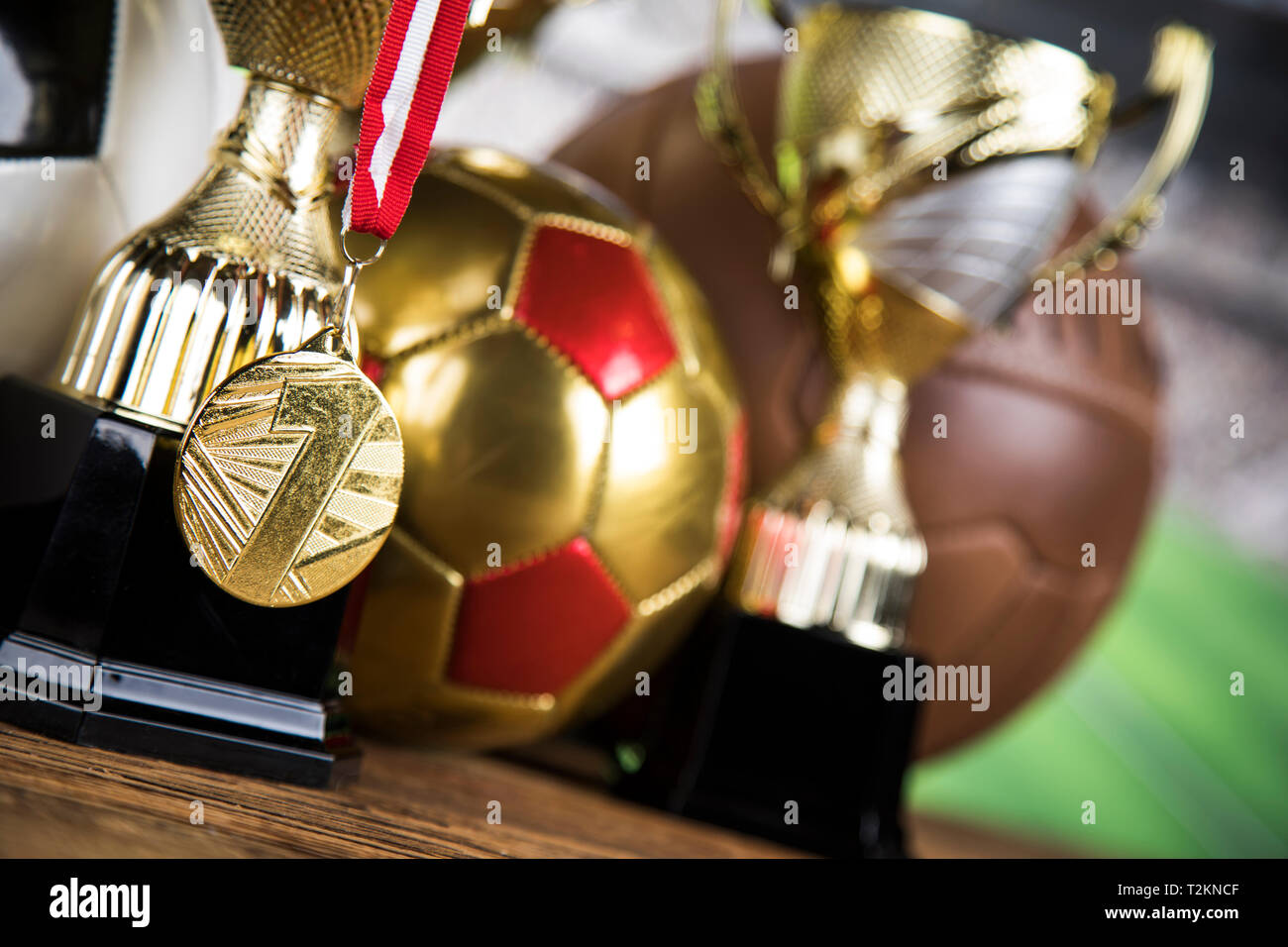Winner trophy, Sport equipment and balls Stock Photo - Alamy