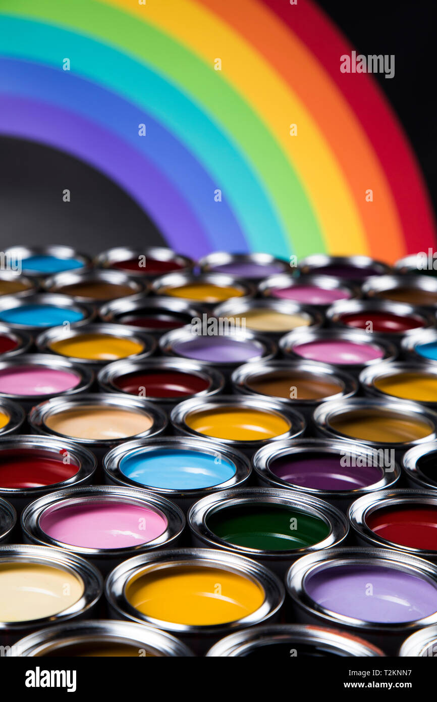 Collection of colored paints cans Stock Photo - Alamy