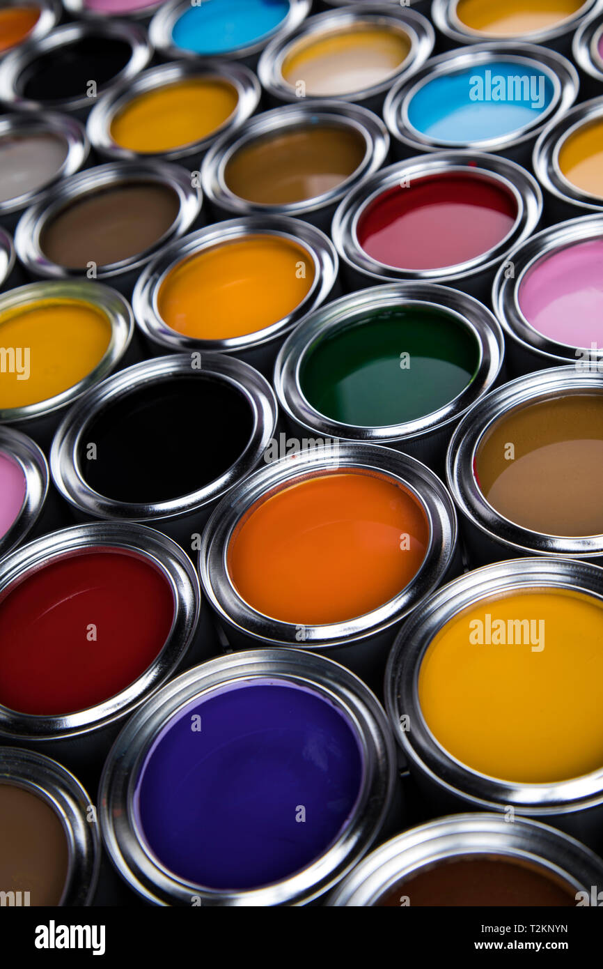 Collection of colored paints cans Stock Photo - Alamy