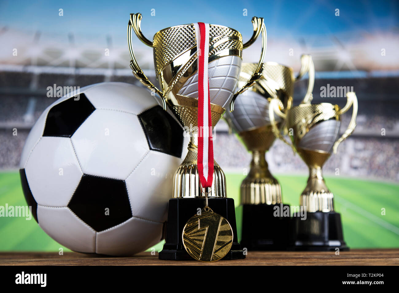 Winner trophy, Sport equipment and balls Stock Photo - Alamy