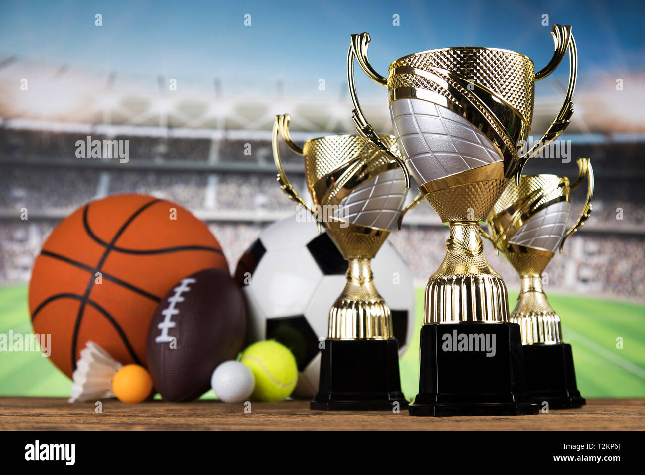 Winner trophy, Sport equipment and balls Stock Photo - Alamy
