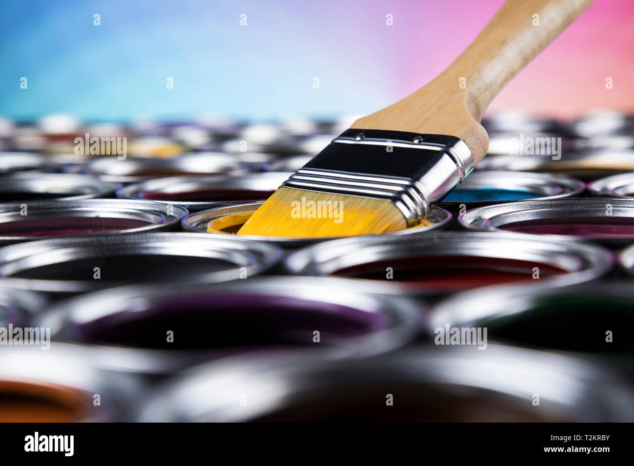 Tin cans with paint, brushes and bright palette of colors Stock Photo ...
