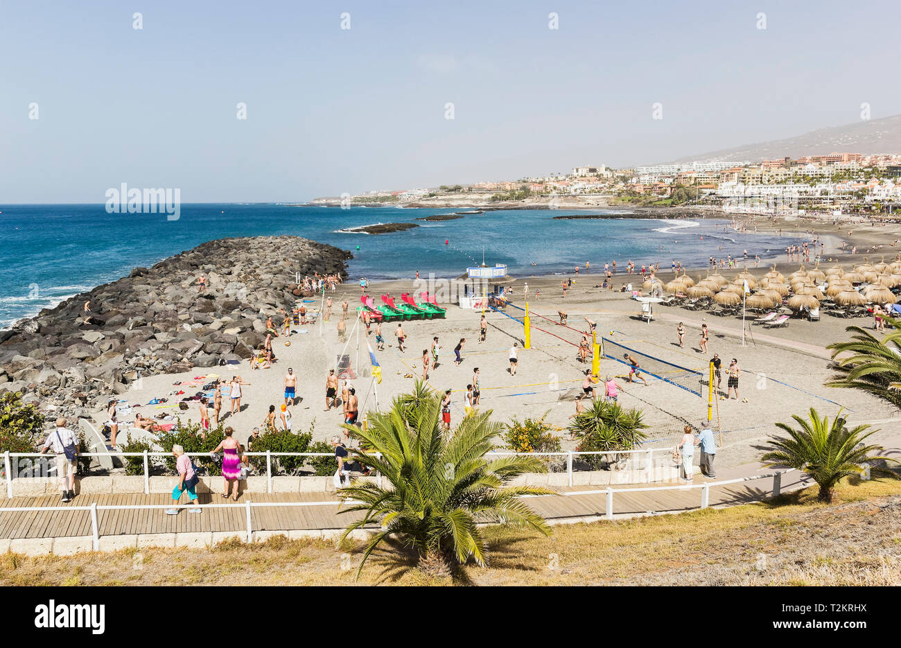 Beach volleyball and water sports at Playa Fanabe, Costa Adeje, Tenerife Stock Photo - Alamy