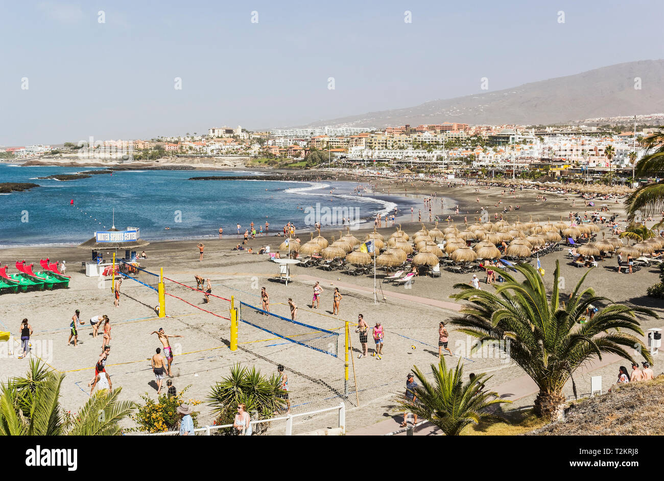 Beach volleyball and water sports at Playa Fanabe, Costa Adeje, Tenerife Stock Photo - Alamy