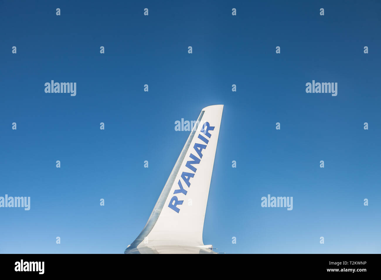 COBH, IRELAND - NOVEMBER 20, 2012: Blue sky and wing. View from window ...