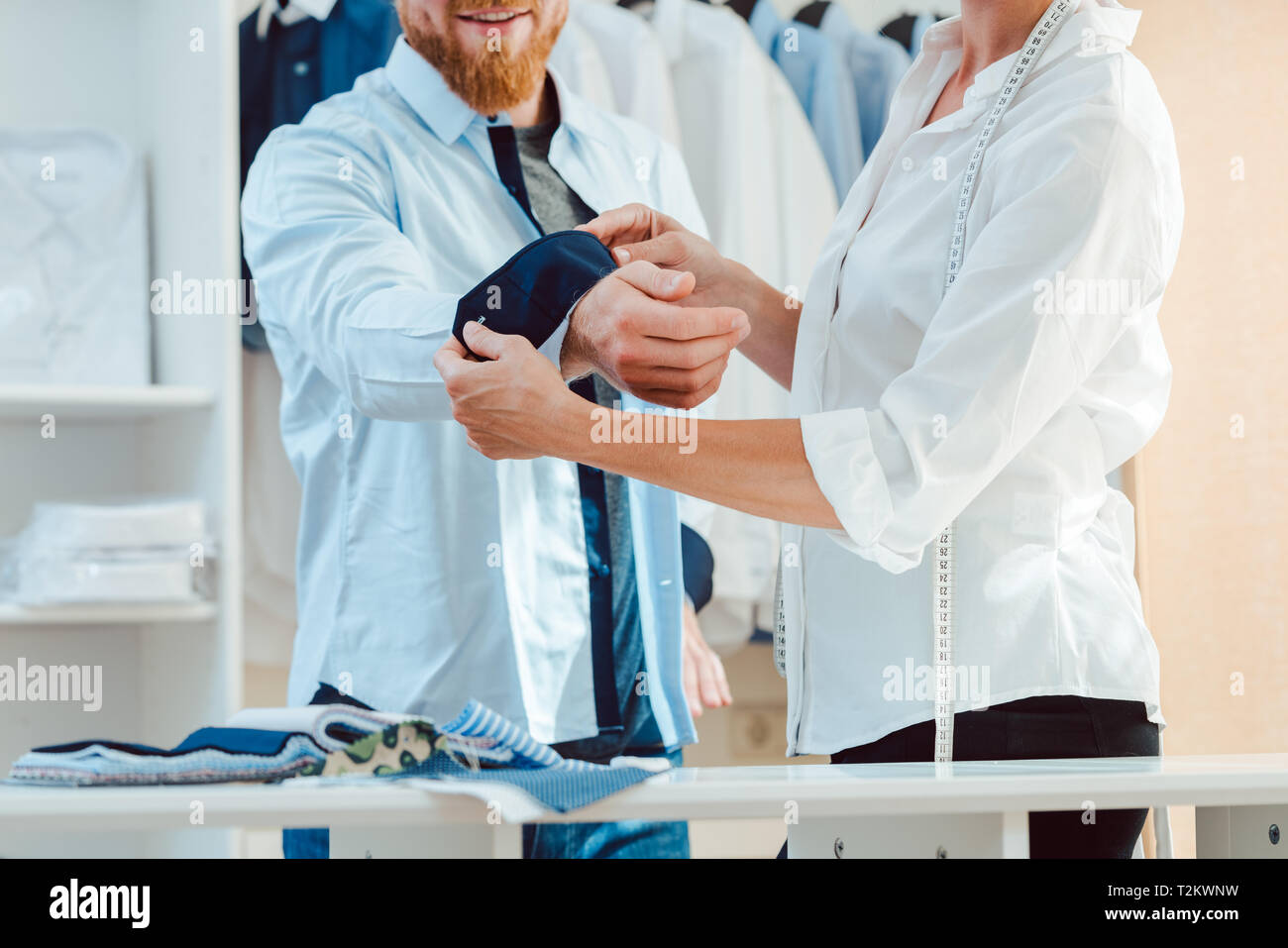 Tailor fitting man in hi-res stock photography and images - Alamy