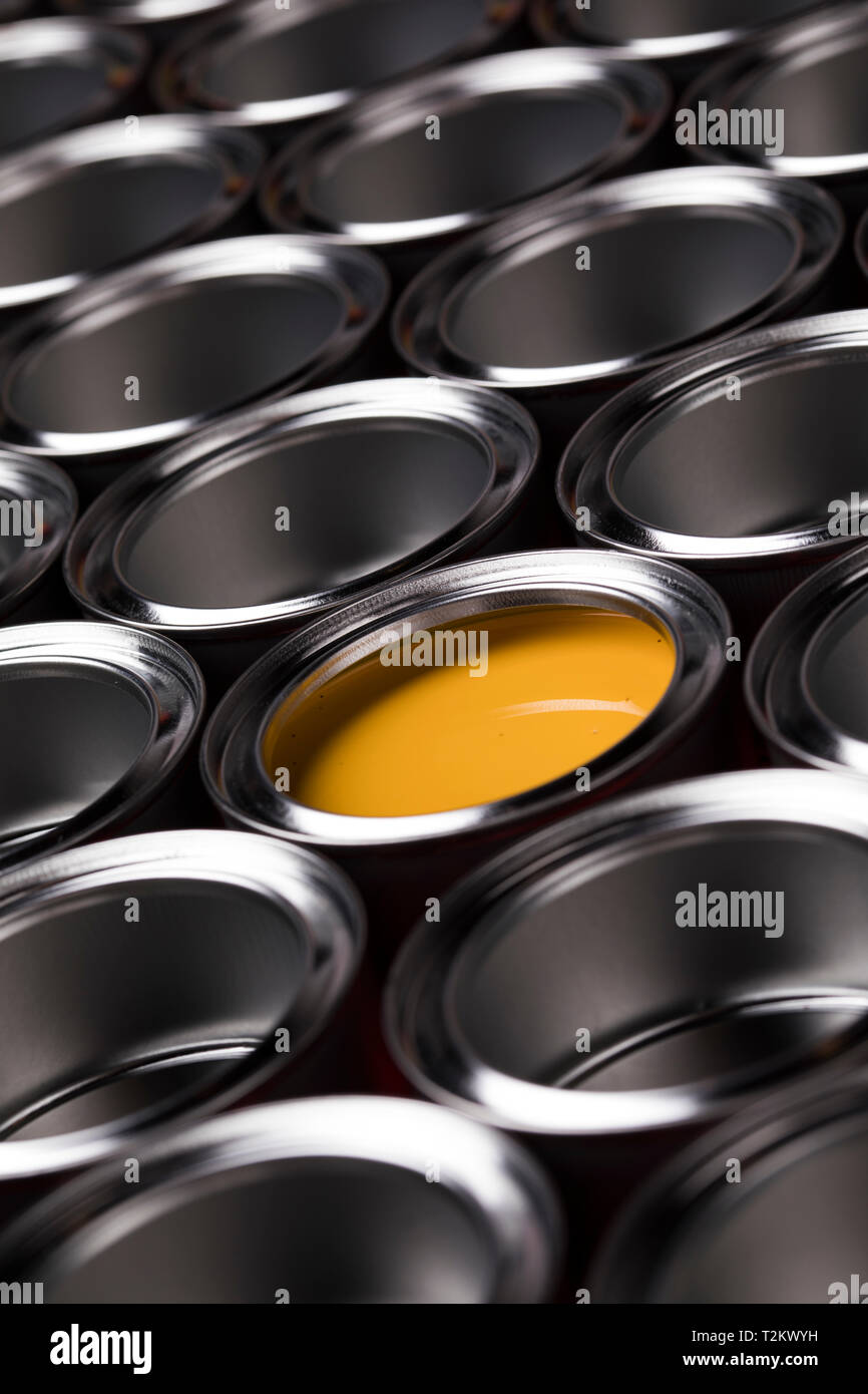 Metal tin paint cans background Stock Photo - Alamy