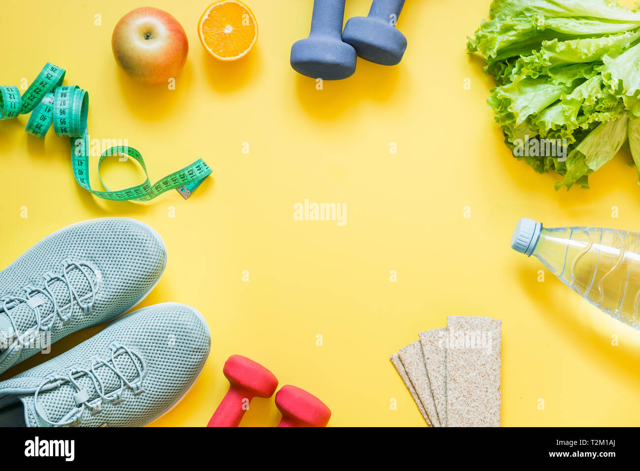 Concept fitness equipment and healthy clean eating. Space for text ...