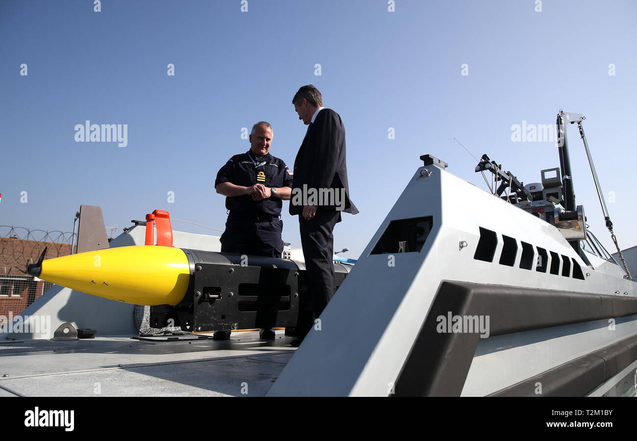 Defence Secretary Gavin Williamson looks at an underwater drone during ...