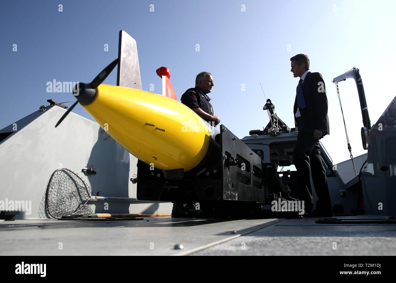 Defence Secretary Gavin Williamson looks at an underwater drone during ...