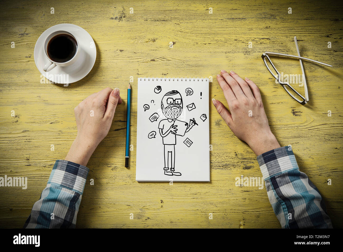 Top view of businessman at workplace and notepad with sketches Stock ...
