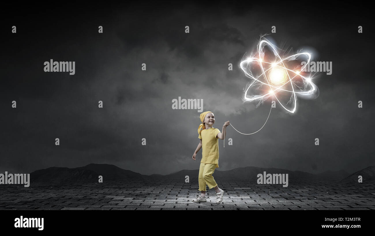 Cute kid girl with atom molecule balloon. Mixed media Stock Photo - Alamy