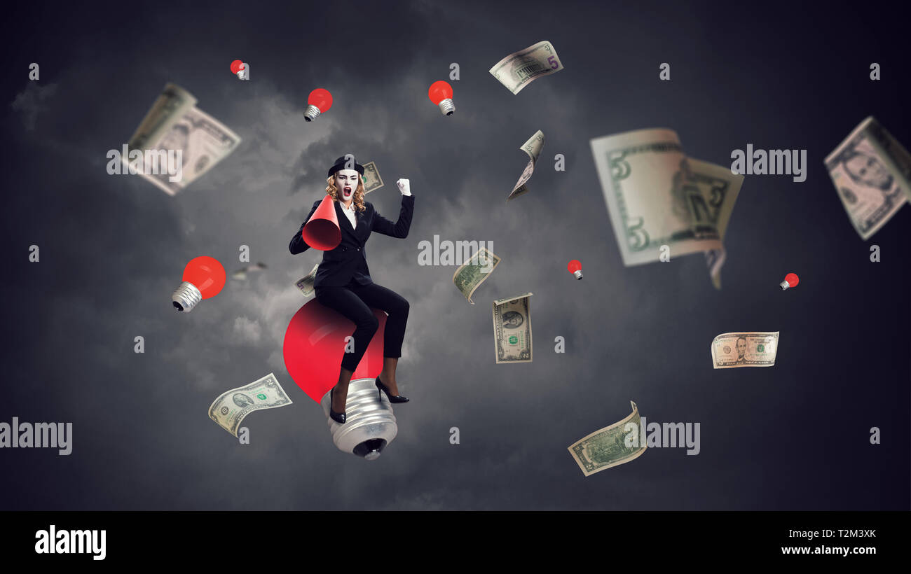 Mime woman in black suit sitting on balloon. Mixed media Stock Photo ...