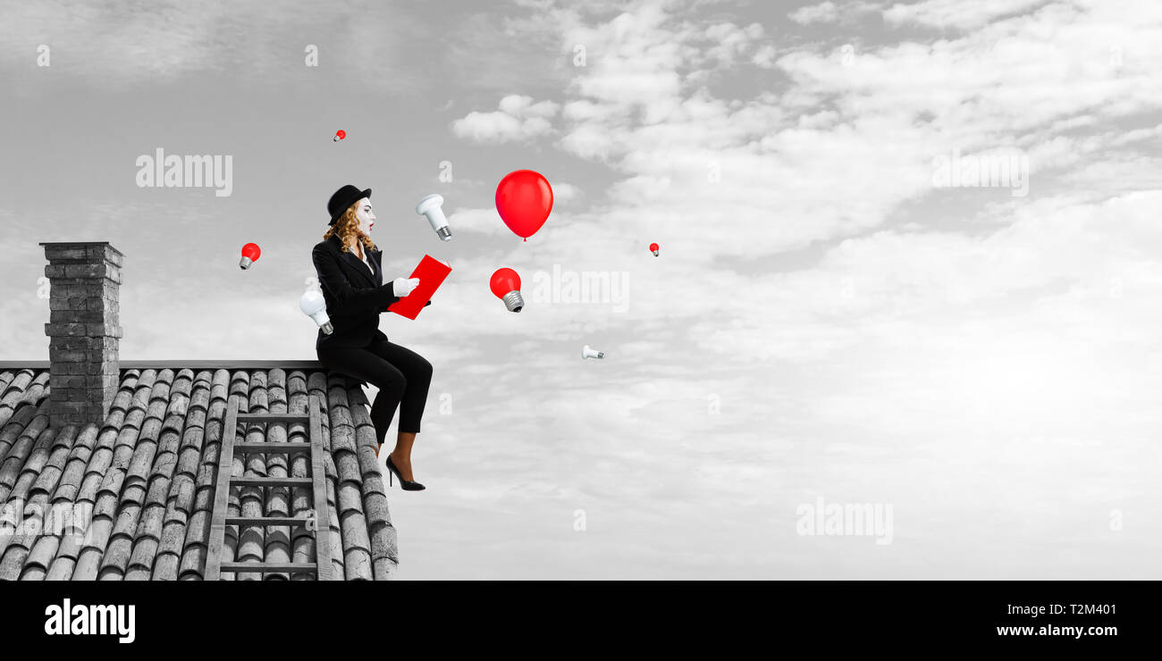 Mime woman in black suit reading red book mixed media hi-res stock ...