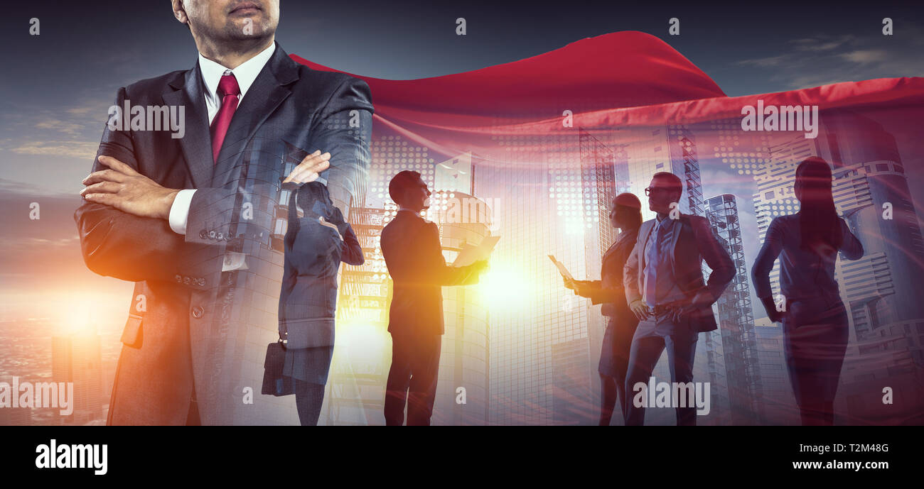 Superhero leader and his successful business team Stock Photo - Alamy