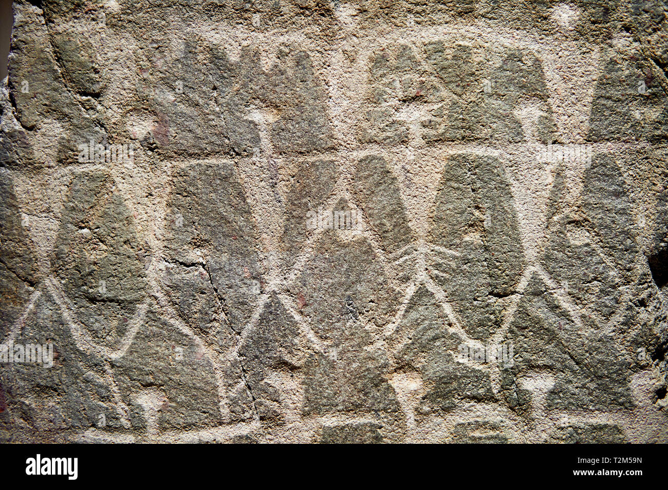 Prehistoric petroglyphs, rock carvings, of geometric designs carved by ...