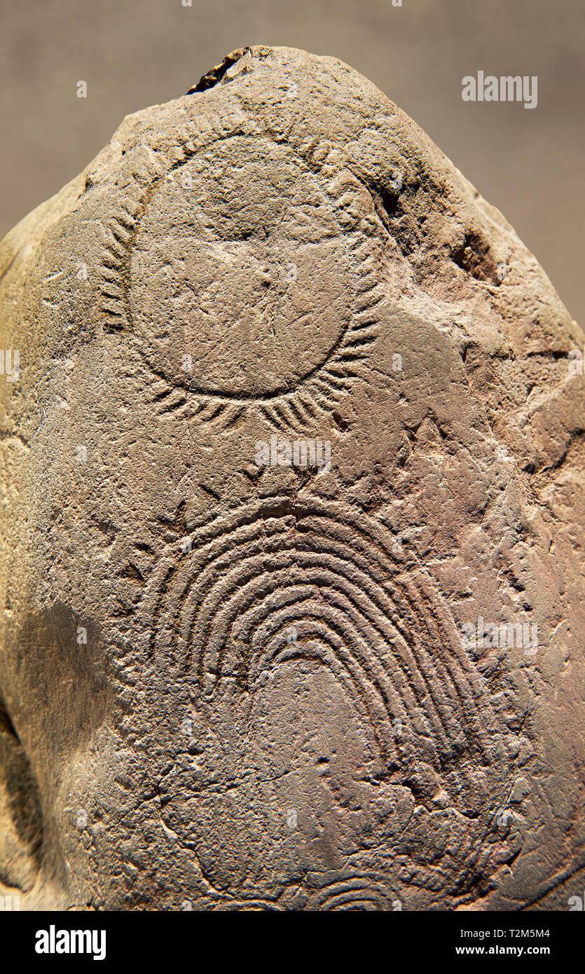 Prehistoric petroglyphs, rock carvings, of geometric designs carved by ...