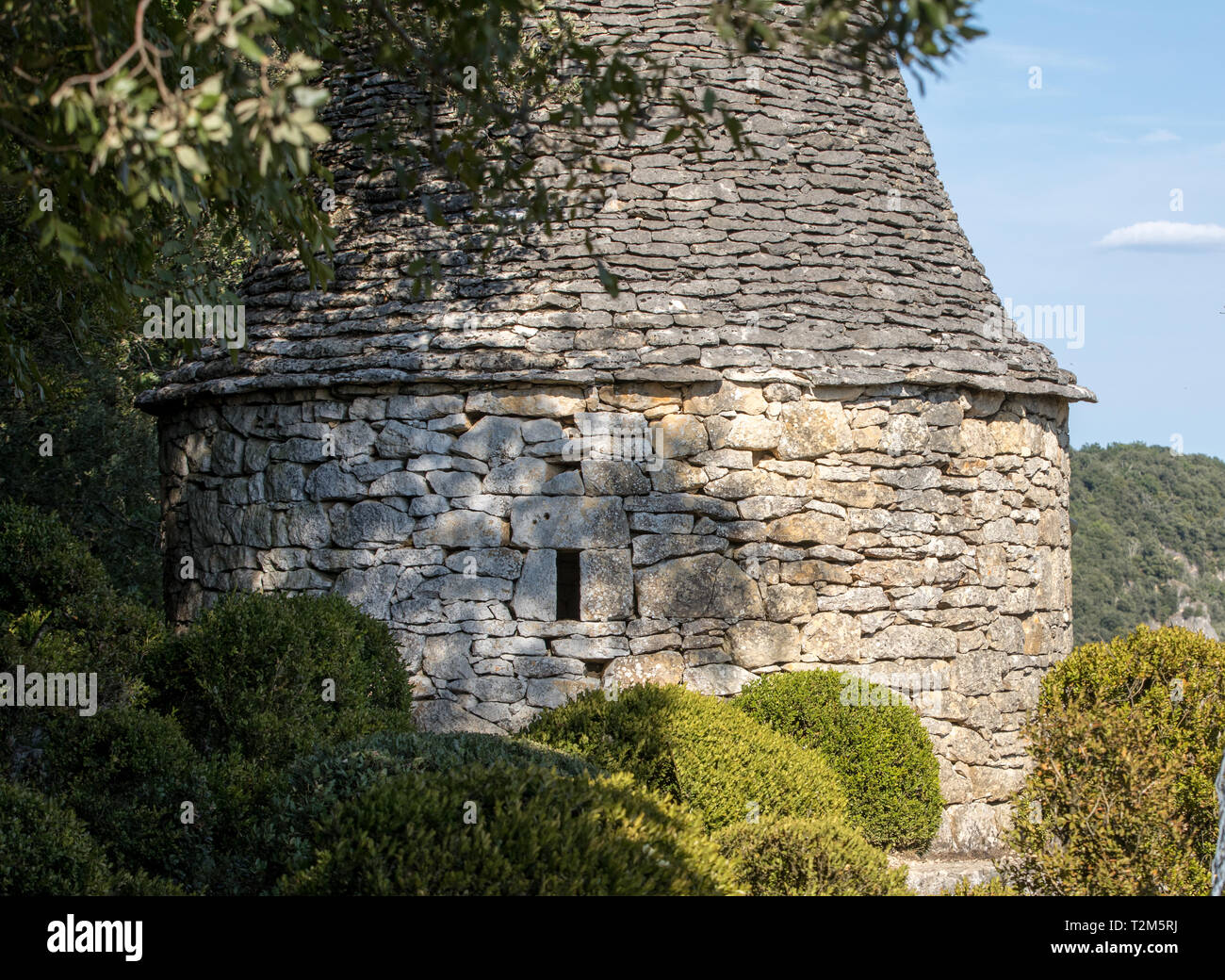 Topiary and stone rotunda in the gardens of the Jardins de Marqueyssac ...
