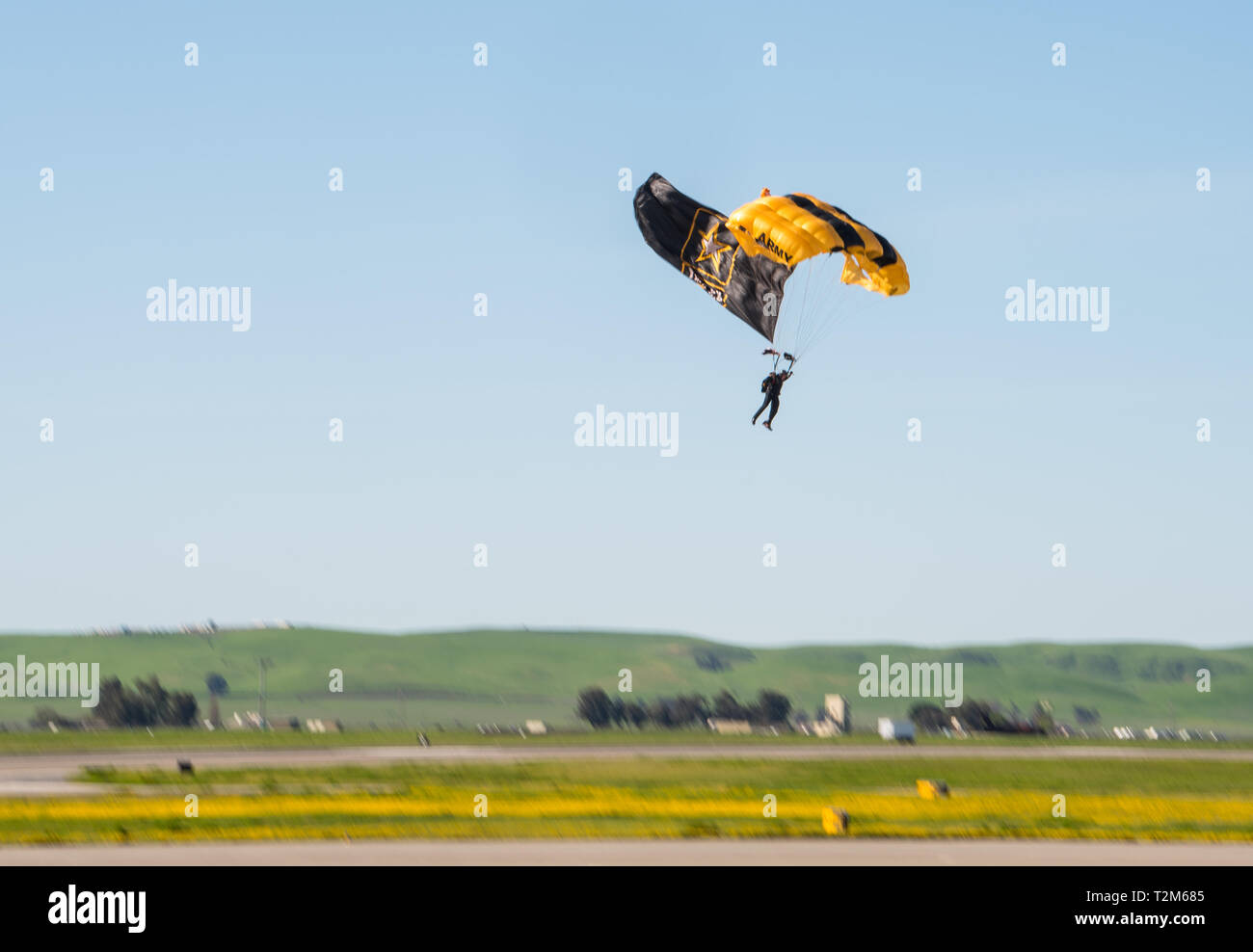A member of the U.S. Army Golden Knights parachute team performs during ...