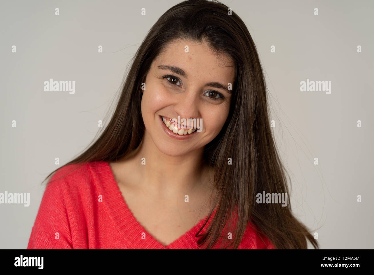 Close up portrait of young beautiful brunette woman with happy face ...