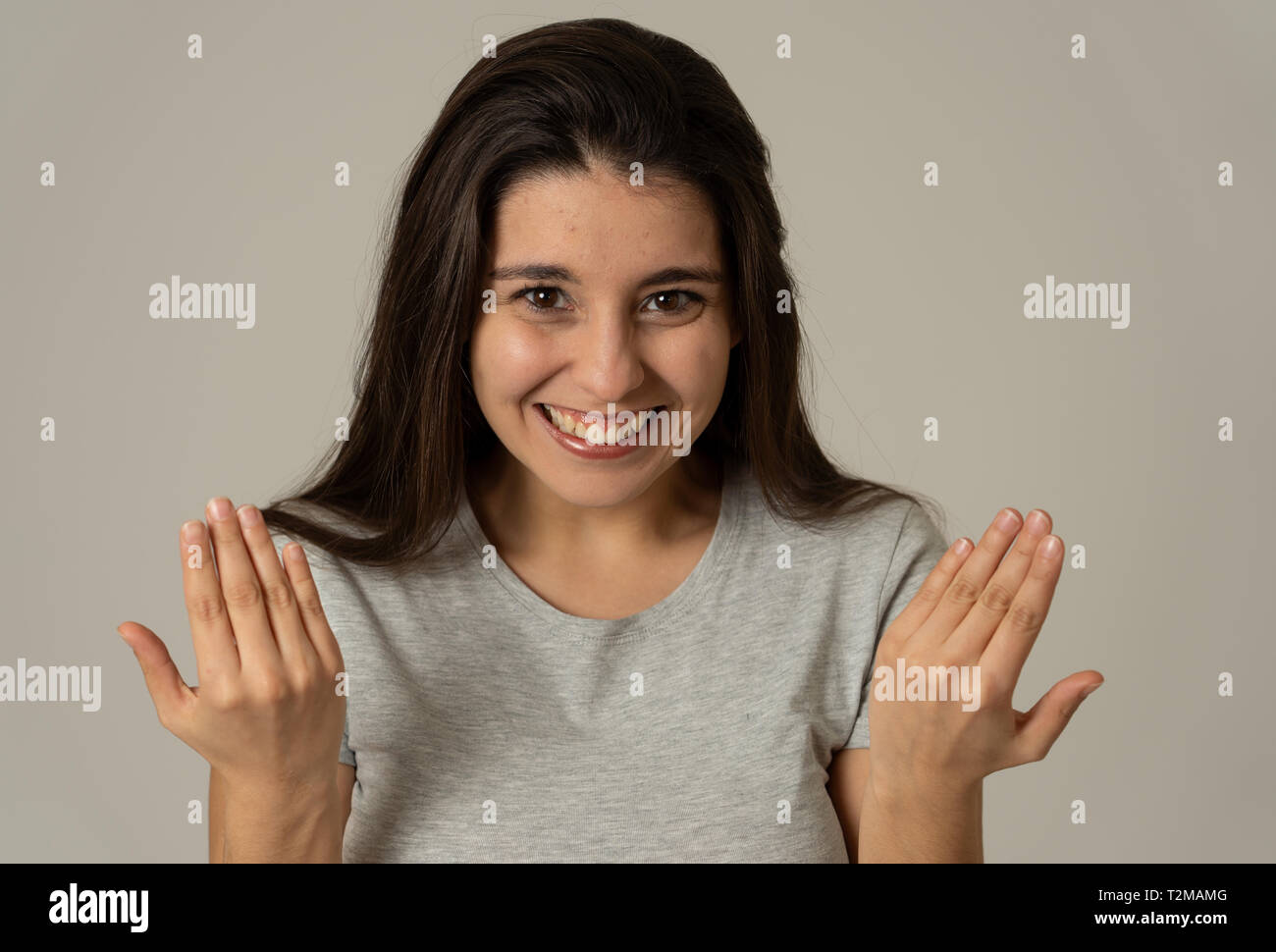 Portrait of beautiful shocked woman hearing good news or having great ...