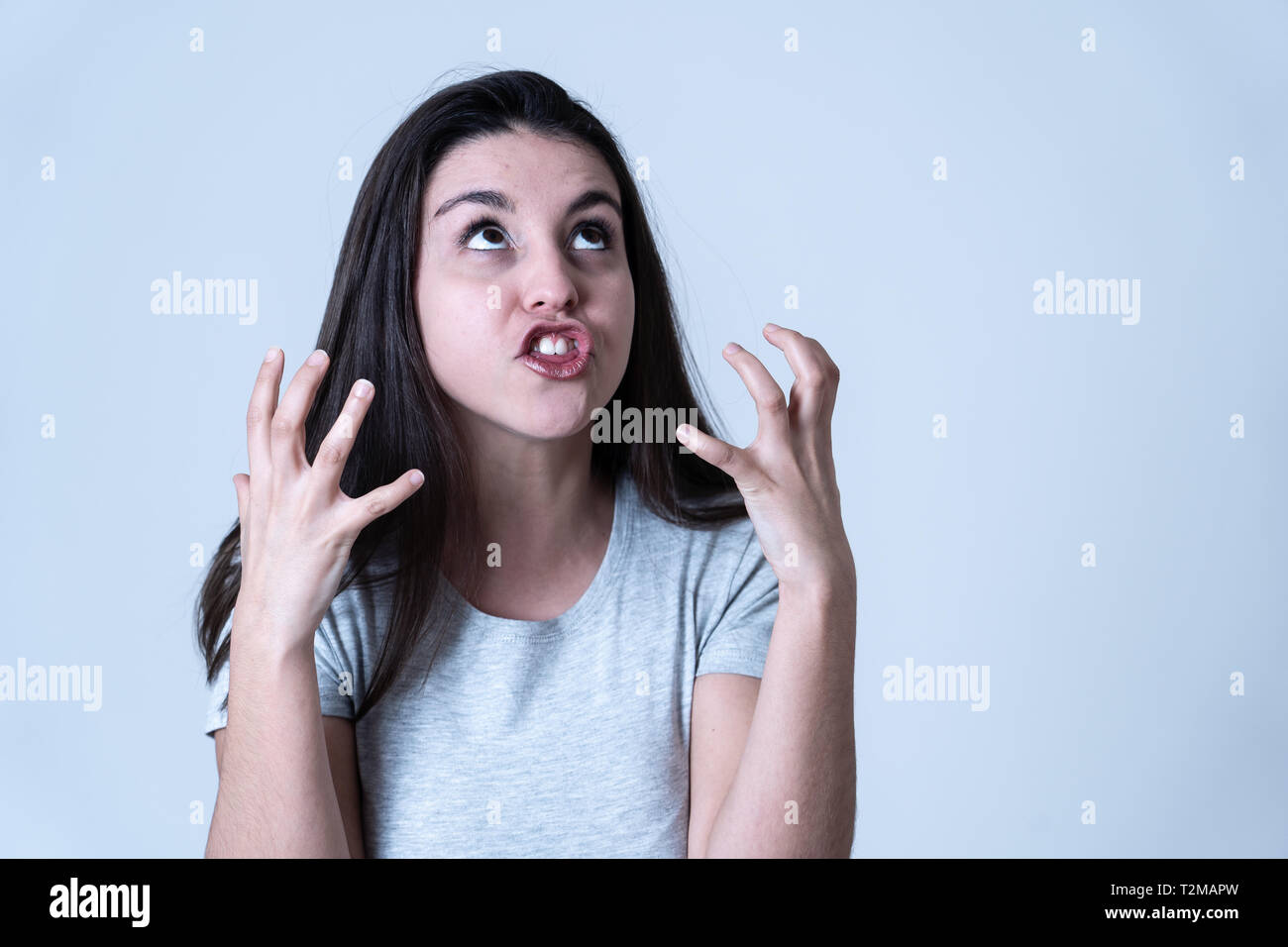 Portrait of young attractive frustrated latin woman with angry and ...