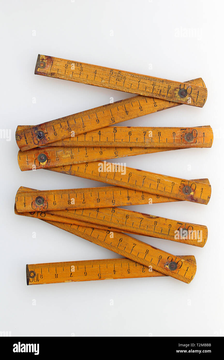 Vintage wooden folding ruler isolated on a white background.isolated on ...