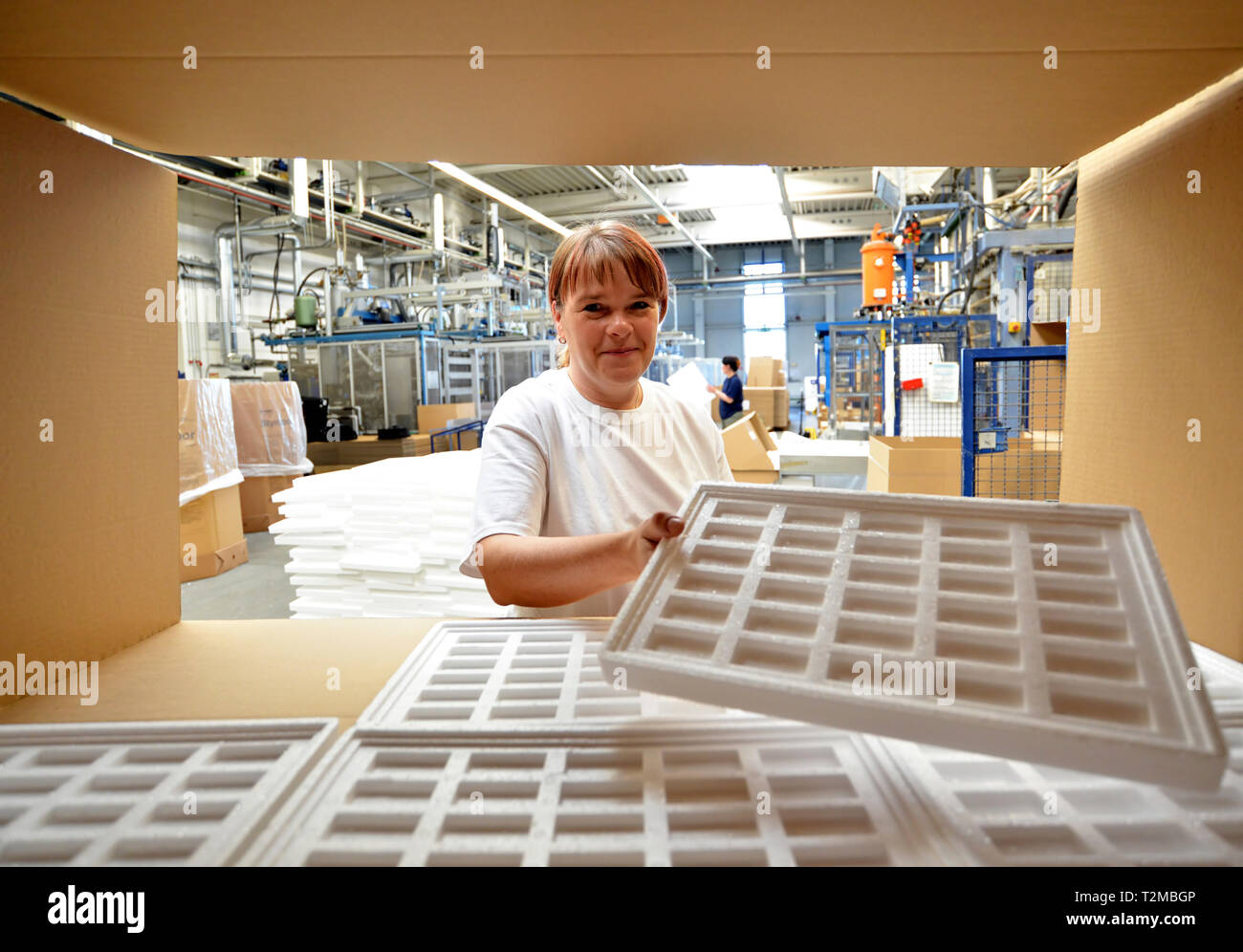 Female worker packing box in warehouse hi-res stock photography and ...