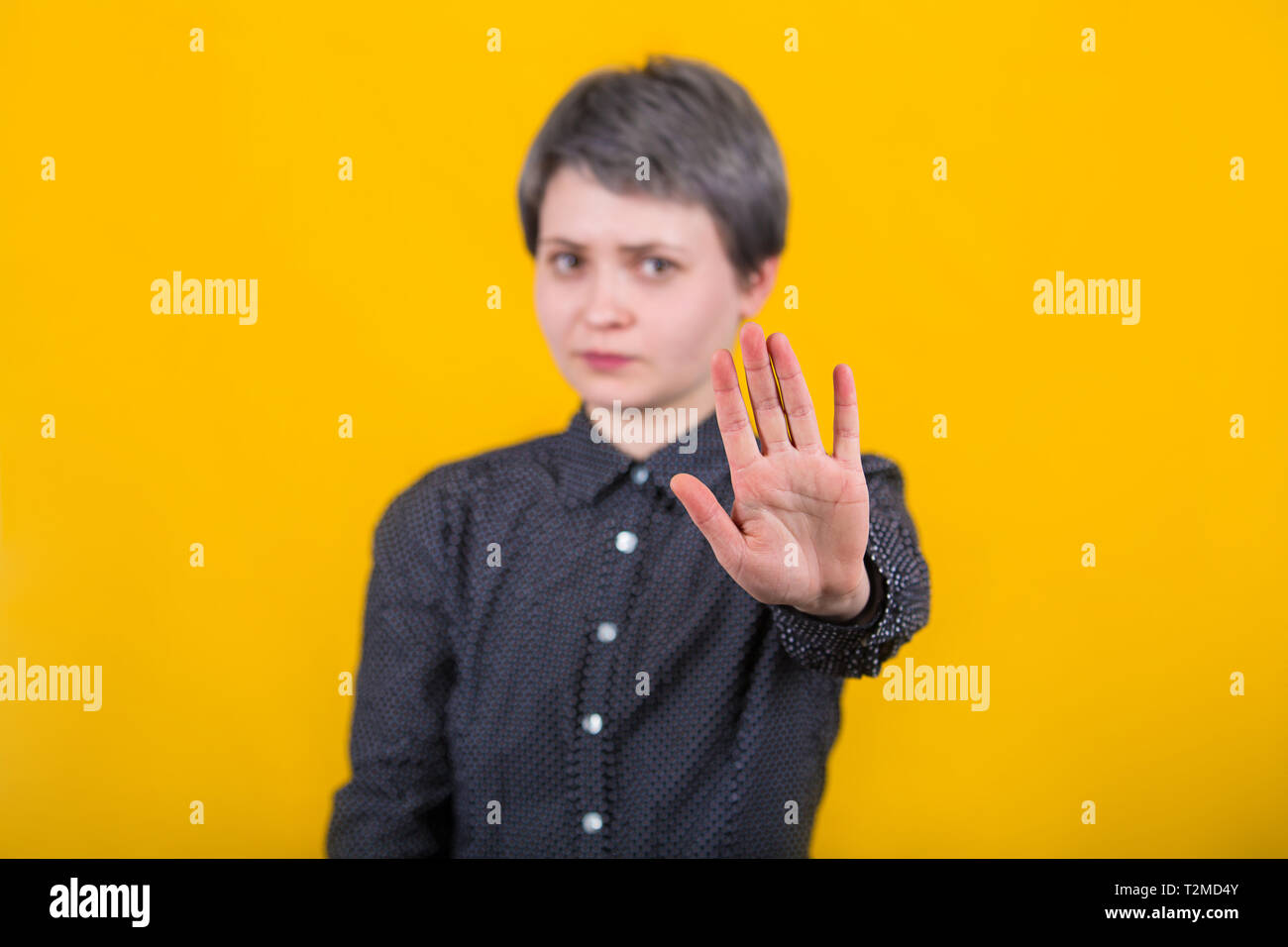 Business woman hand up stop hi-res stock photography and images - Alamy