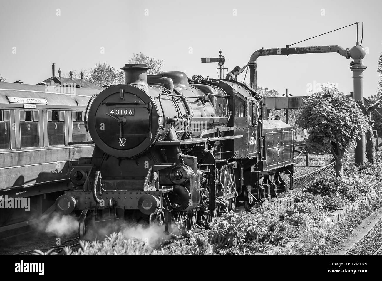 Black & white close up of vintage UK steam locomotive, front, in the ...