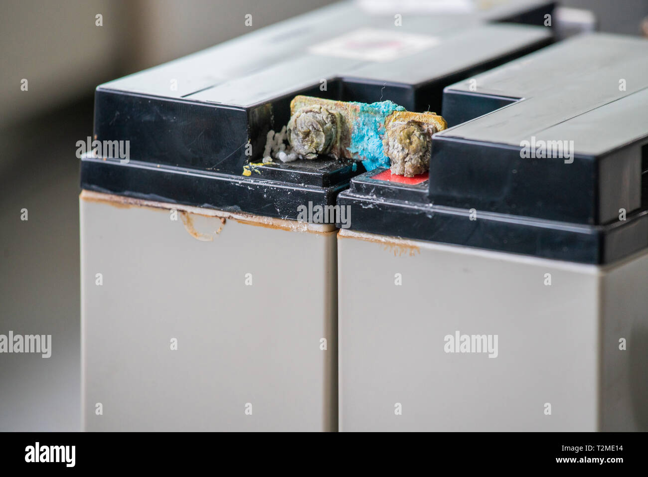Old battery corrosion, seal lead acid battery damage Stock Photo - Alamy