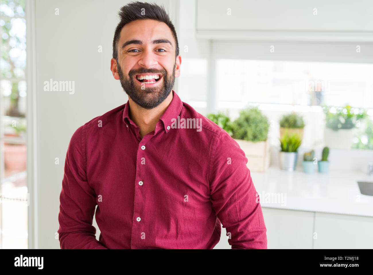 Handsome man smiling cheerful with a big smile on face showing teeth ...