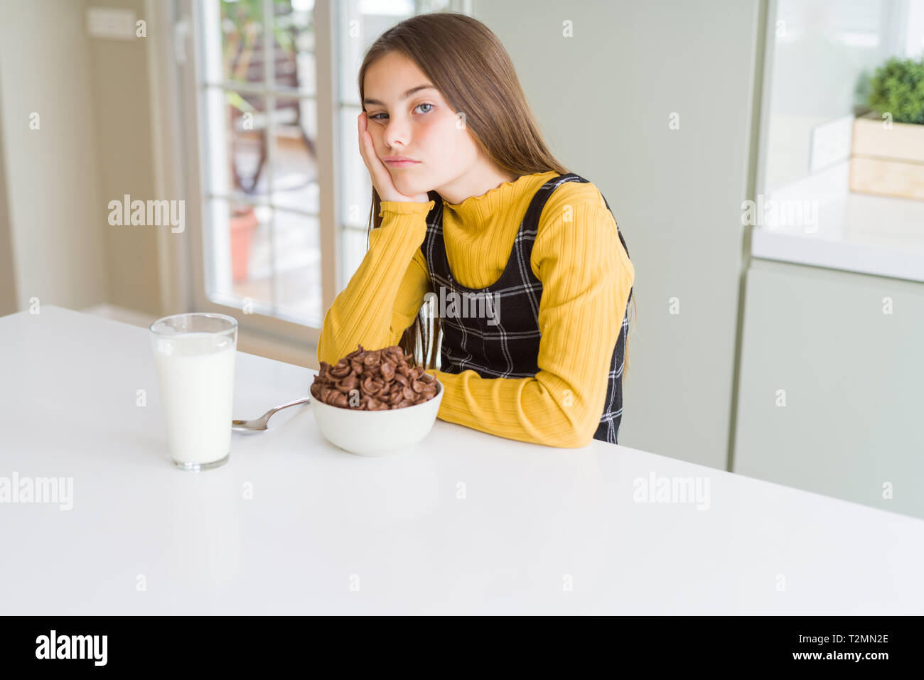 Bored eating chocolate hi-res stock photography and images - Alamy