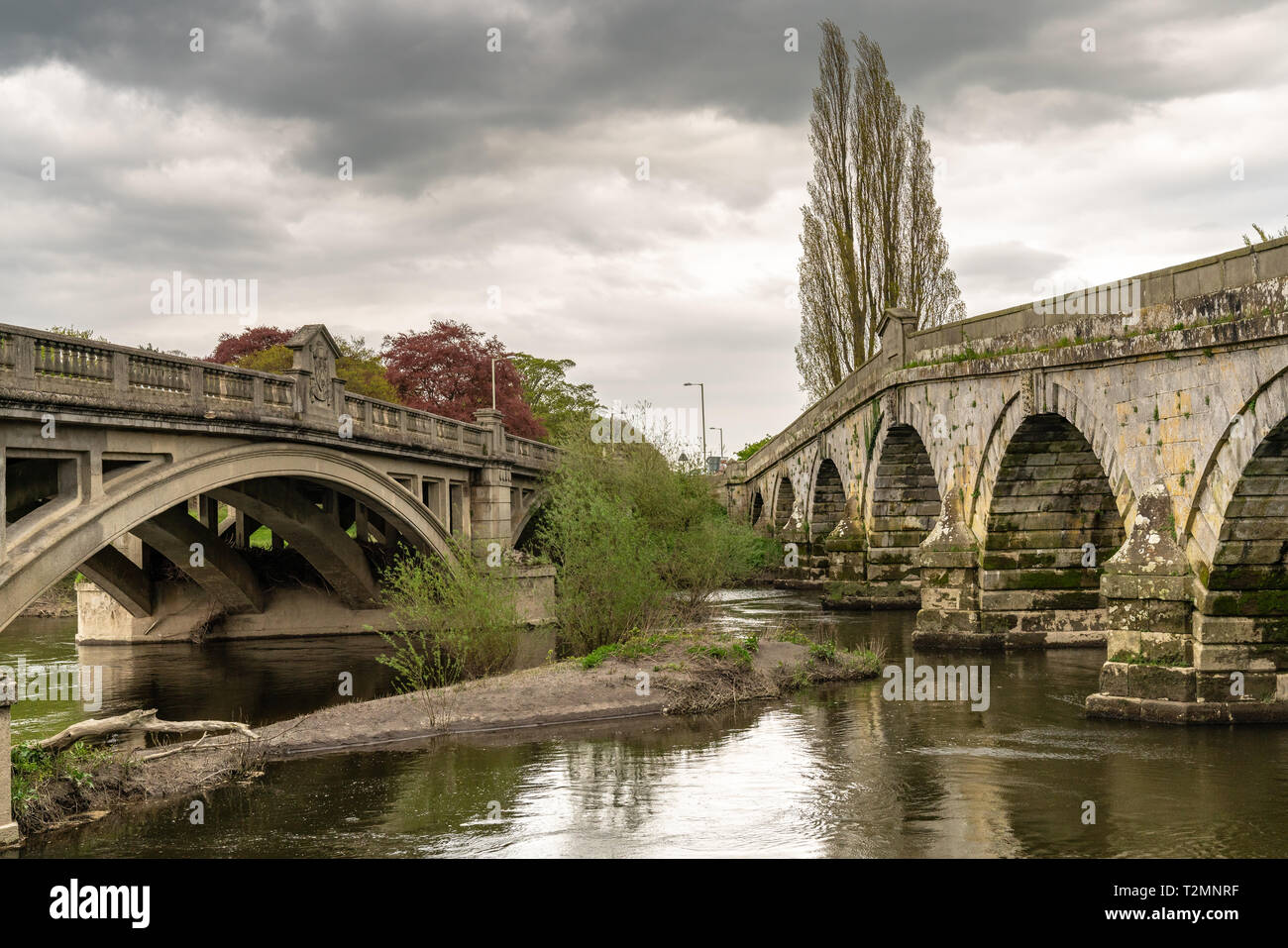 The old bridge and Atcham Bridge over the River Severn in Atcham, near ...