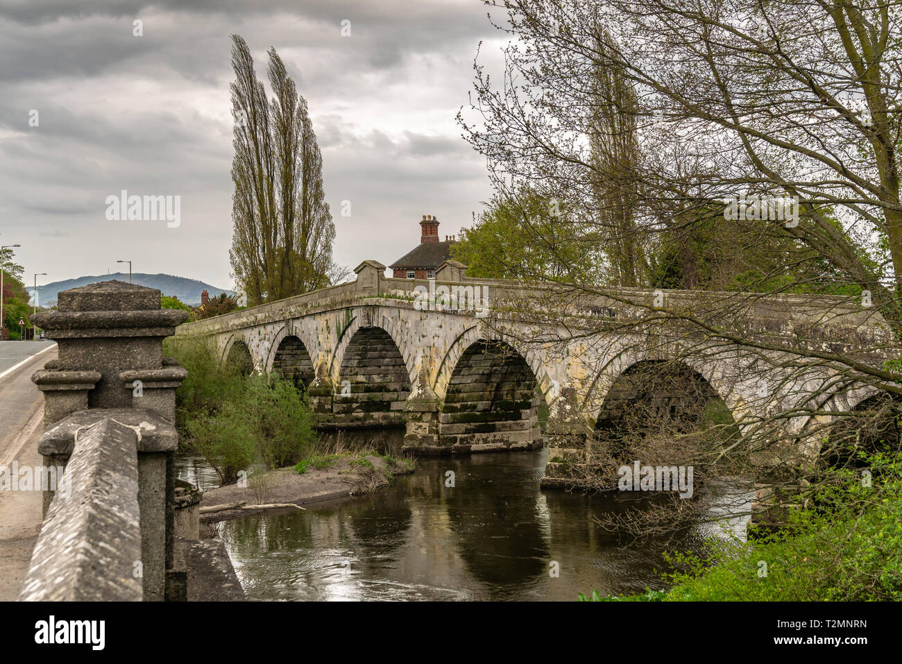 The old bridge and Atcham Bridge over the River Severn in Atcham, near ...
