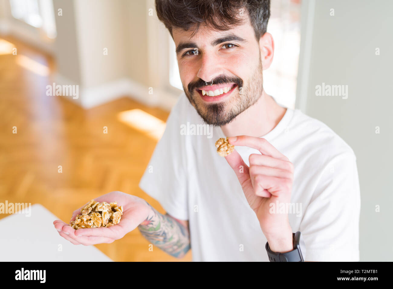 Man eating nuts hi-res stock photography and images - Alamy