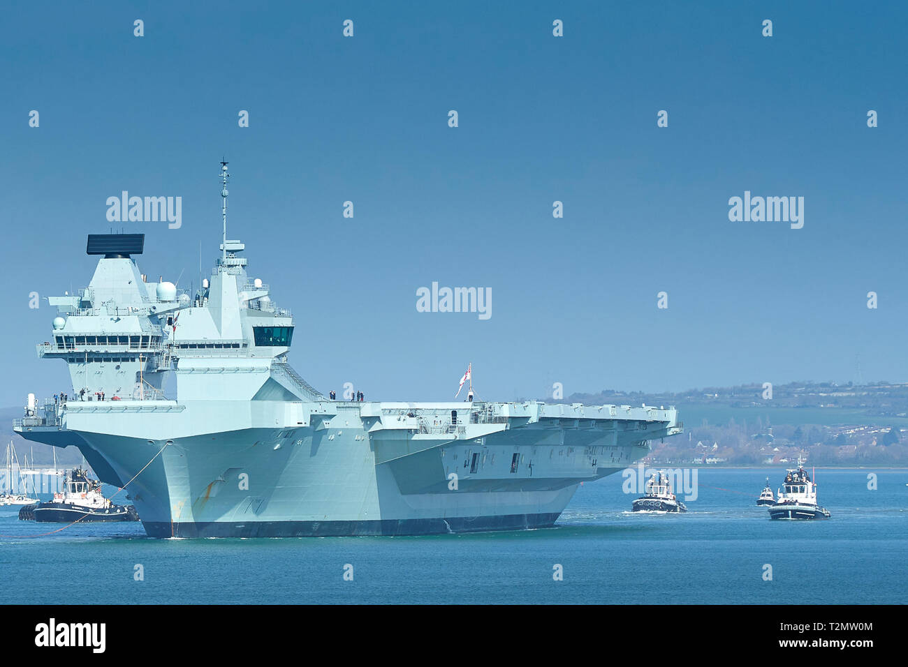 Royal Navy Aircraft Carrier, HMS QUEEN ELIZABETH, Being Assisted By 5 ...