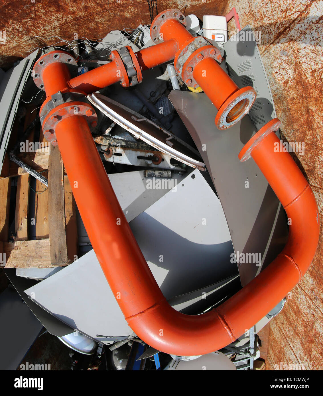 old big orange tube in the garbage container Stock Photo - Alamy