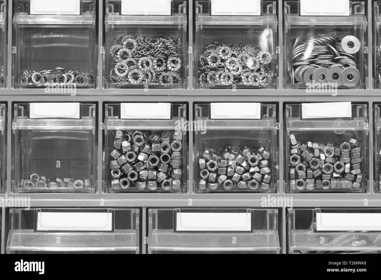 bolts and screws lock nuts for sale at hardware shop Stock Photo - Alamy