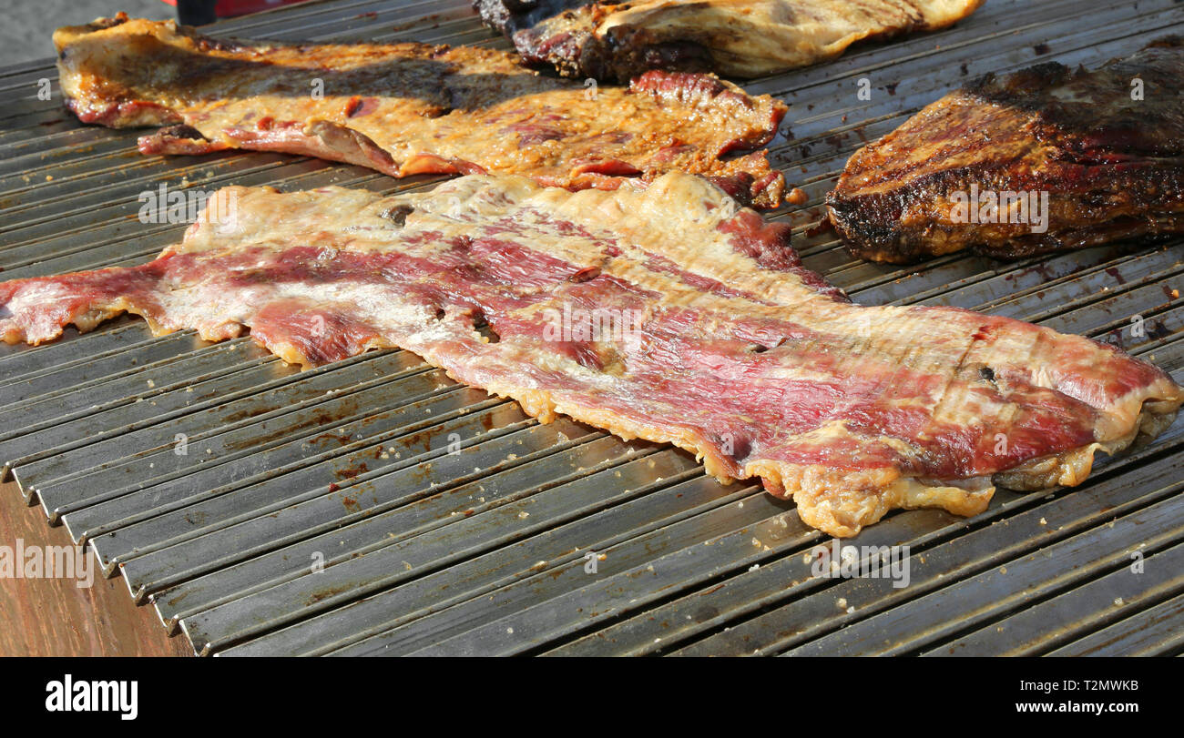 bbq meat in a stall of steert food with bacon and pork Stock Photo - Alamy