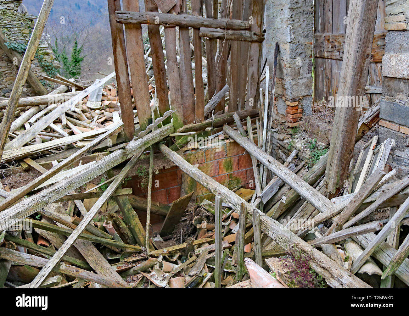 planks and rubble and the ruins of the house completely destroyed by ...