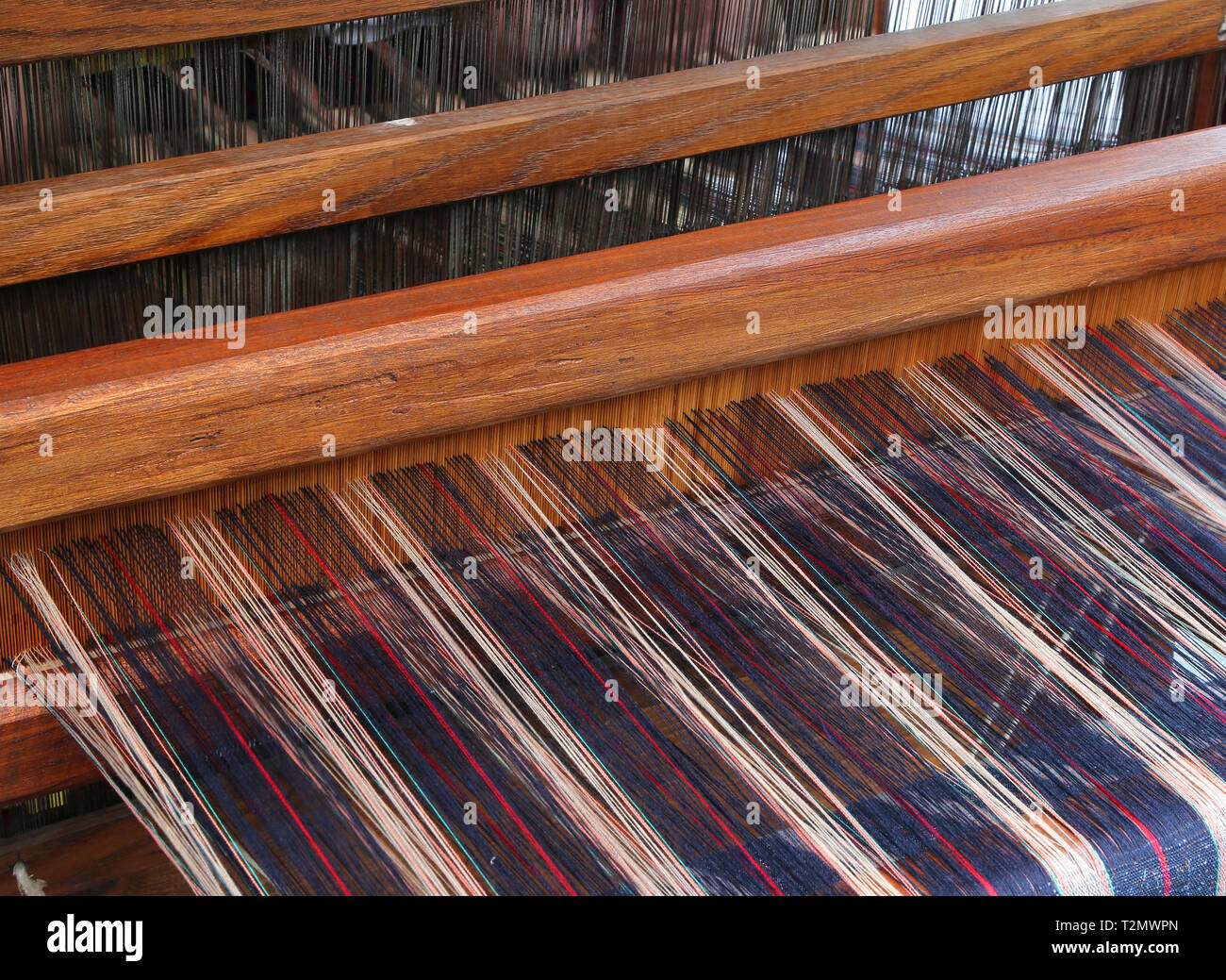 Wooden frame spinning fabric hi-res stock photography and images - Alamy