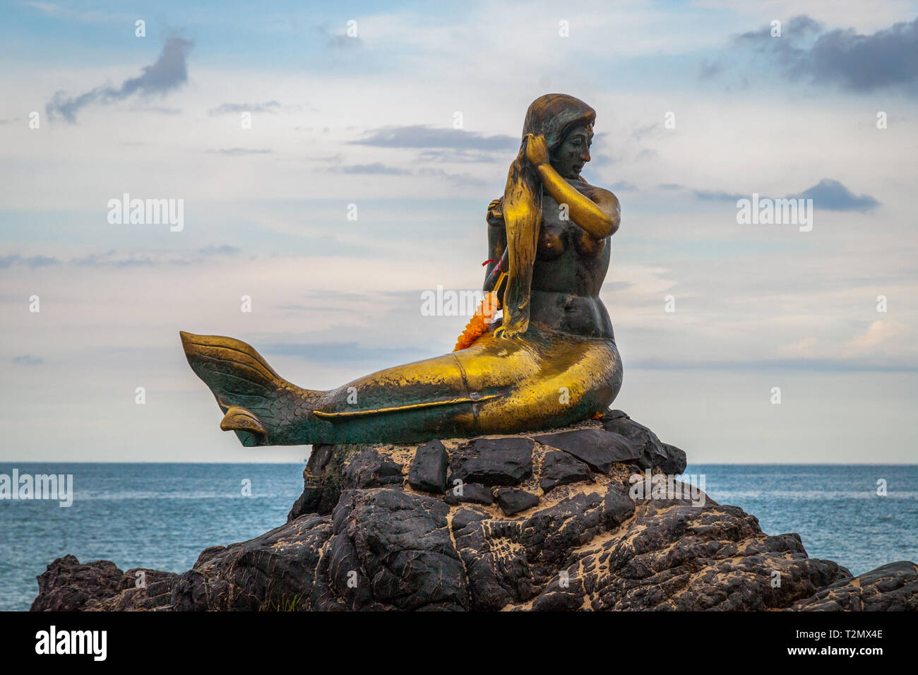 Golden Mermaid statue at Samila beach, Songkhla, Thailand Stock Photo ...