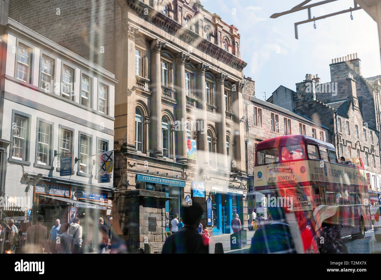 Reflections in an Edinburgh shop window Stock Photo - Alamy