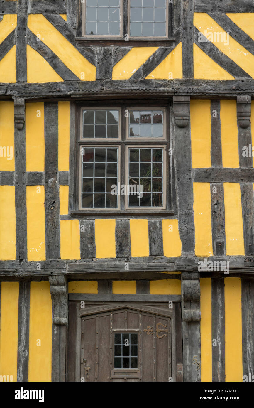 Yellow timber frame building Stock Photo - Alamy