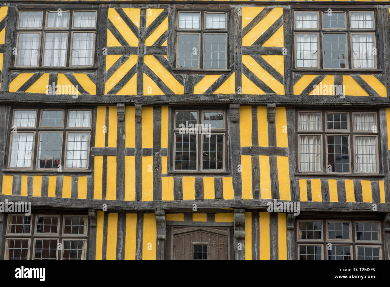 Yellow timber frame building Stock Photo - Alamy