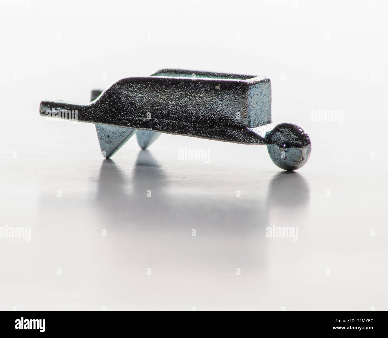 Monopoly board game pieces Stock Photo - Alamy